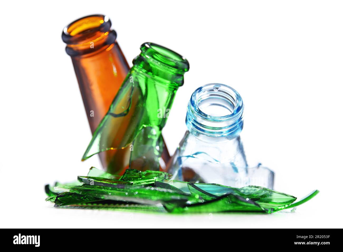 Broken glass bottles over white background. Recycling Stock Photo - Alamy
