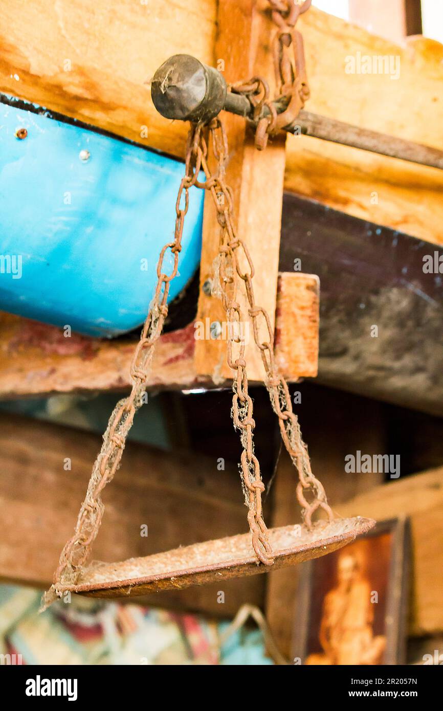 Old-fashioned scales hanging Stock Photo - Alamy