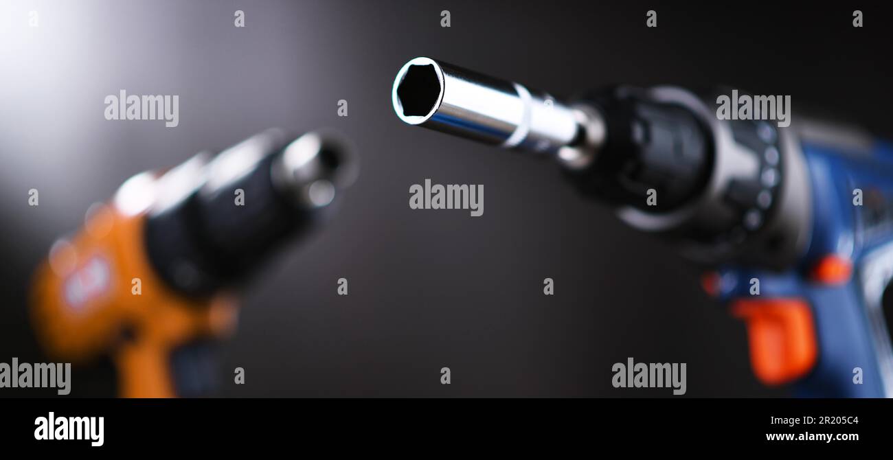A screw gun and a pistol-grip cordless drill Stock Photo - Alamy