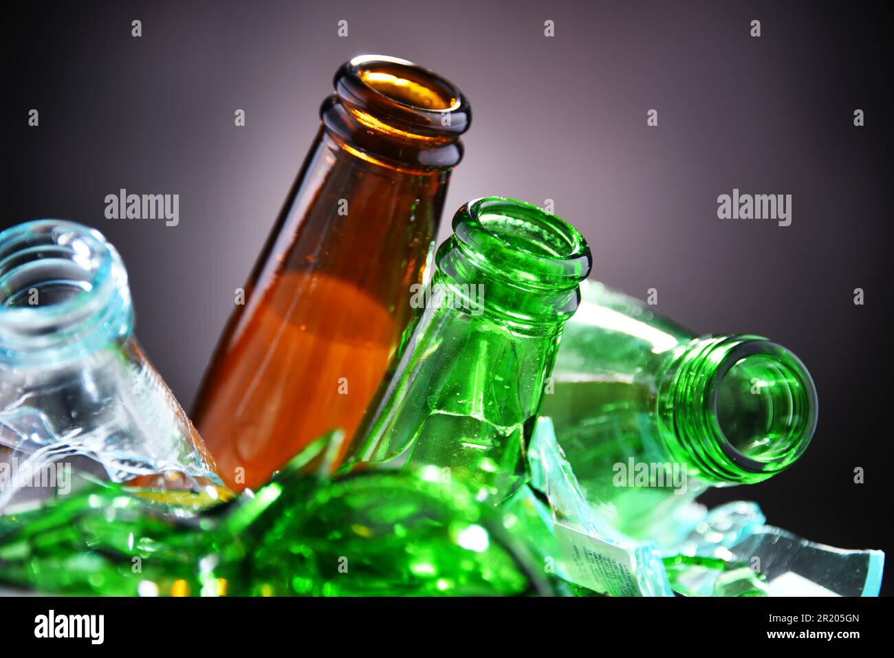 Broken glass bottles and pieces of glass. Recycling Stock Photo - Alamy
