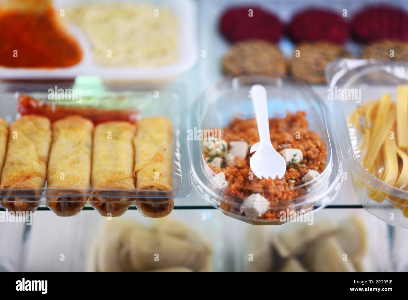 A variety of prepackaged food products in plastic boxes Stock Photo - Alamy
