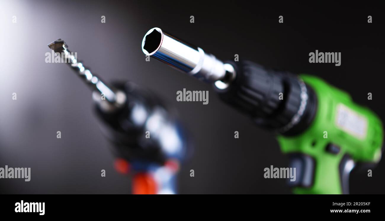 A screw gun and a pistol-grip cordless drill Stock Photo - Alamy