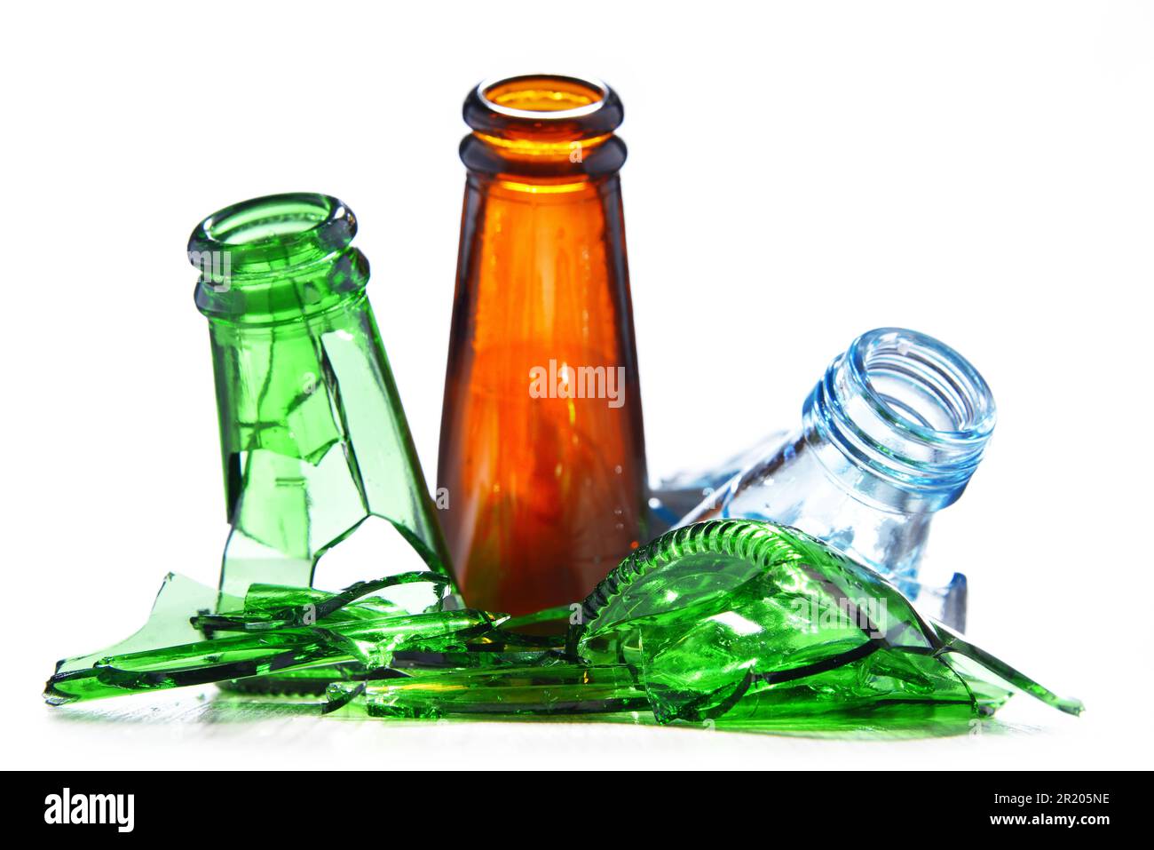 Broken glass bottles over white background. Recycling Stock Photo - Alamy