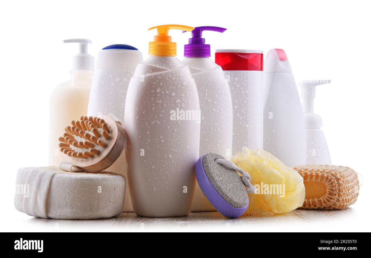 Plastic contaiers of shampoos and shower gels isolated on white ...