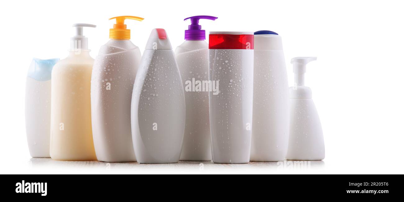 Plastic contaiers of shampoos and shower gels isolated on white ...