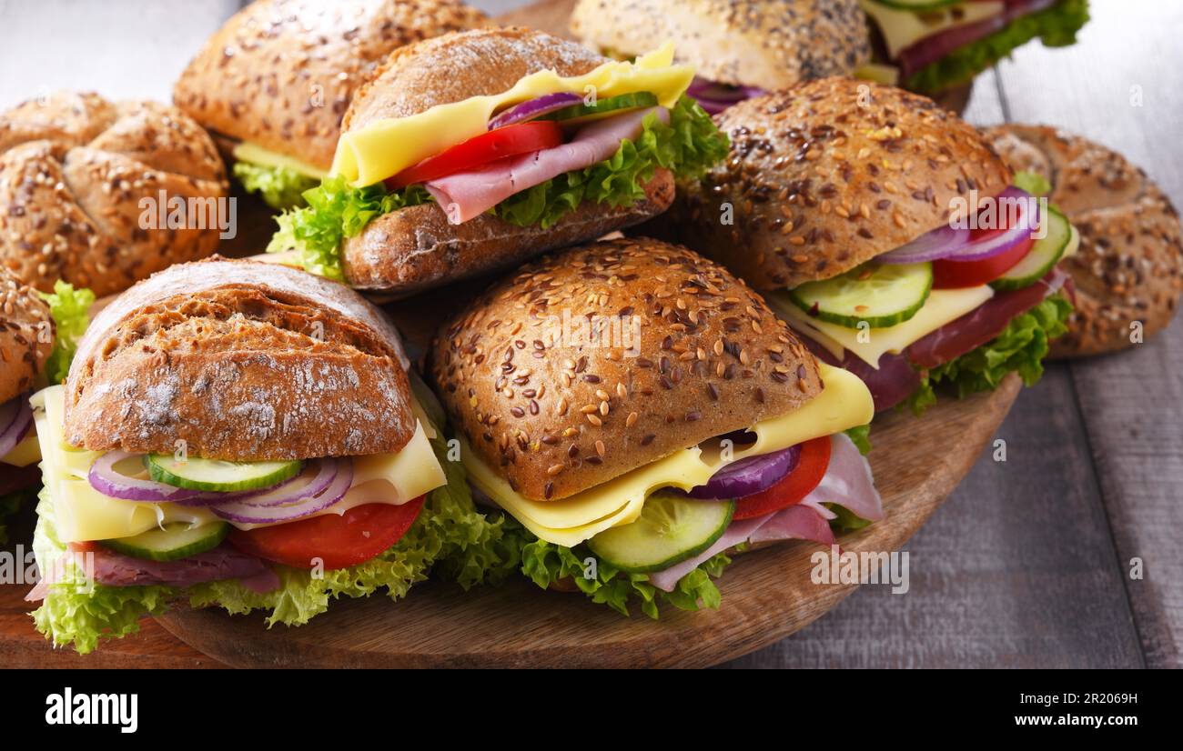 Ham and cheese sandwiches on the kitchen table Stock Photo - Alamy
