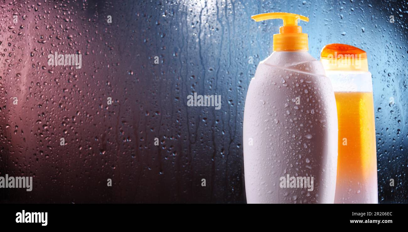 Different containers of body care products in the bathroom Stock Photo ...