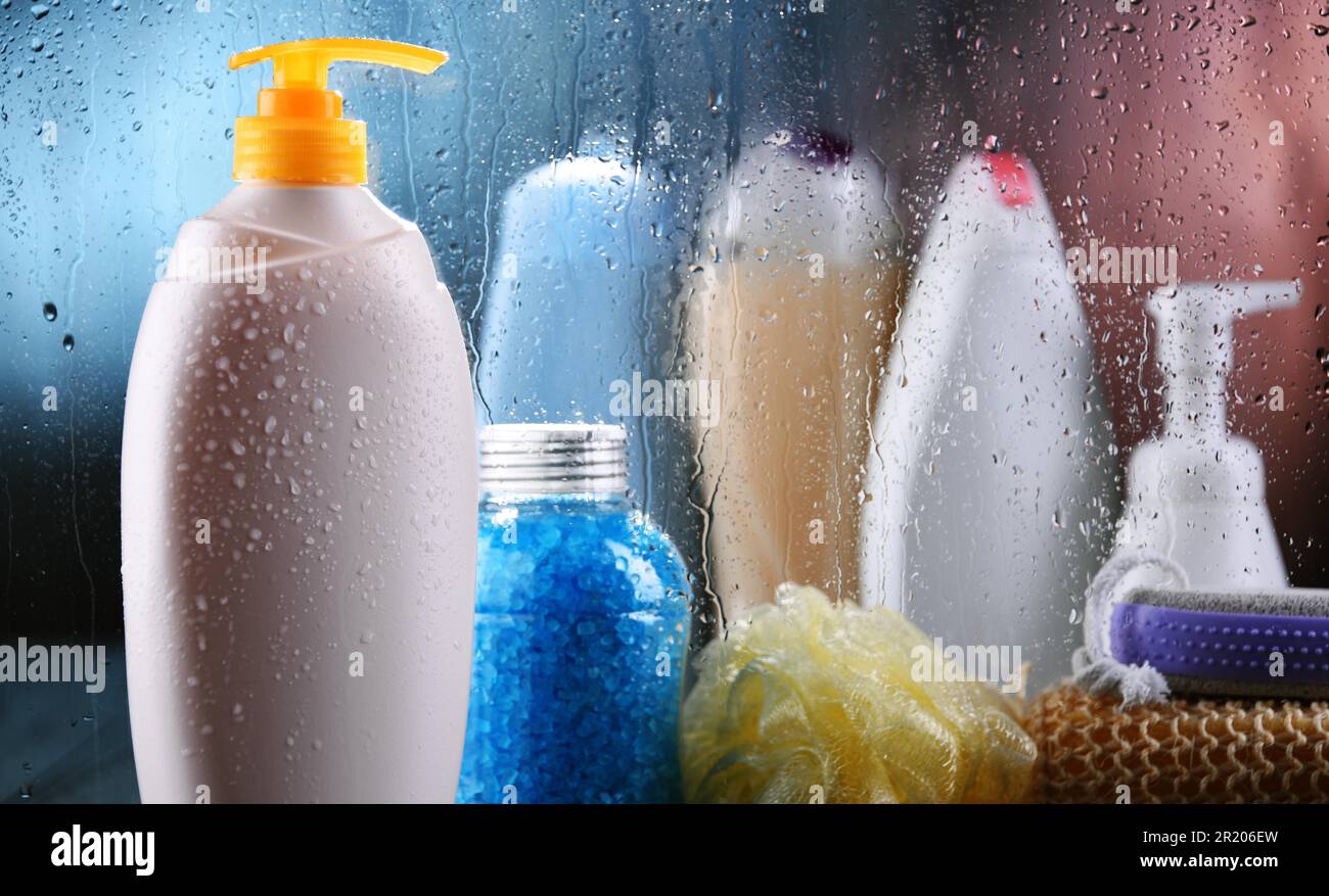 Different containers of body care products in the bathroom Stock Photo ...