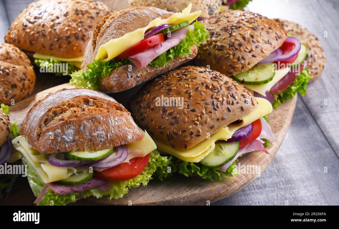 Ham and cheese sandwiches on the kitchen table Stock Photo - Alamy