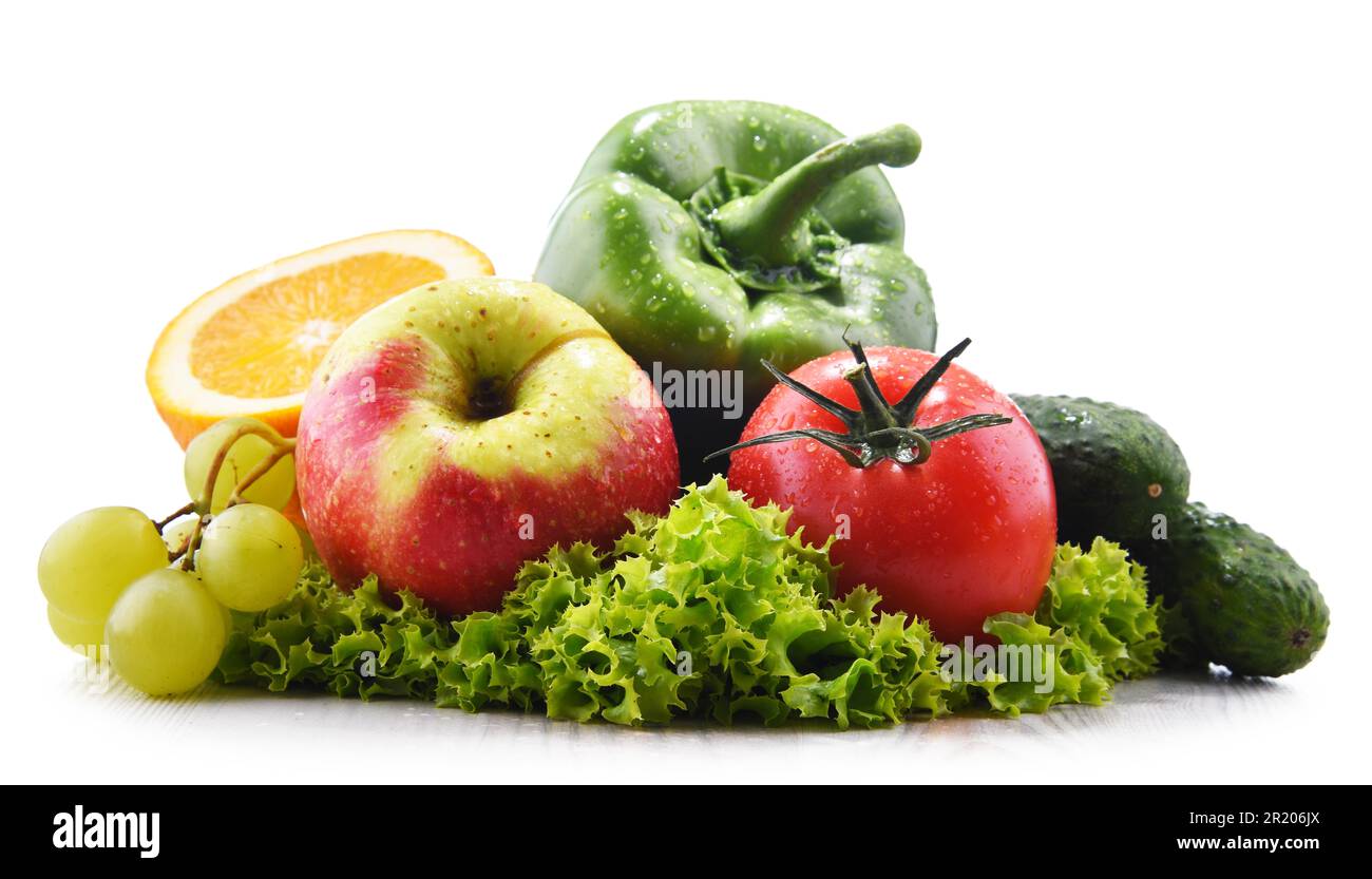 Composition with fresh vegetables and fruits isolated on white ...