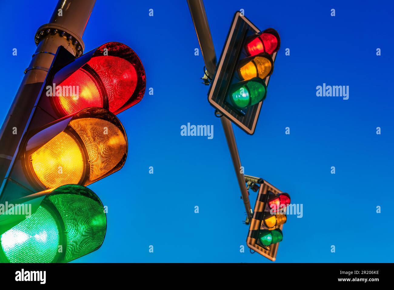 Traffic lights over urban intersection Stock Photo - Alamy
