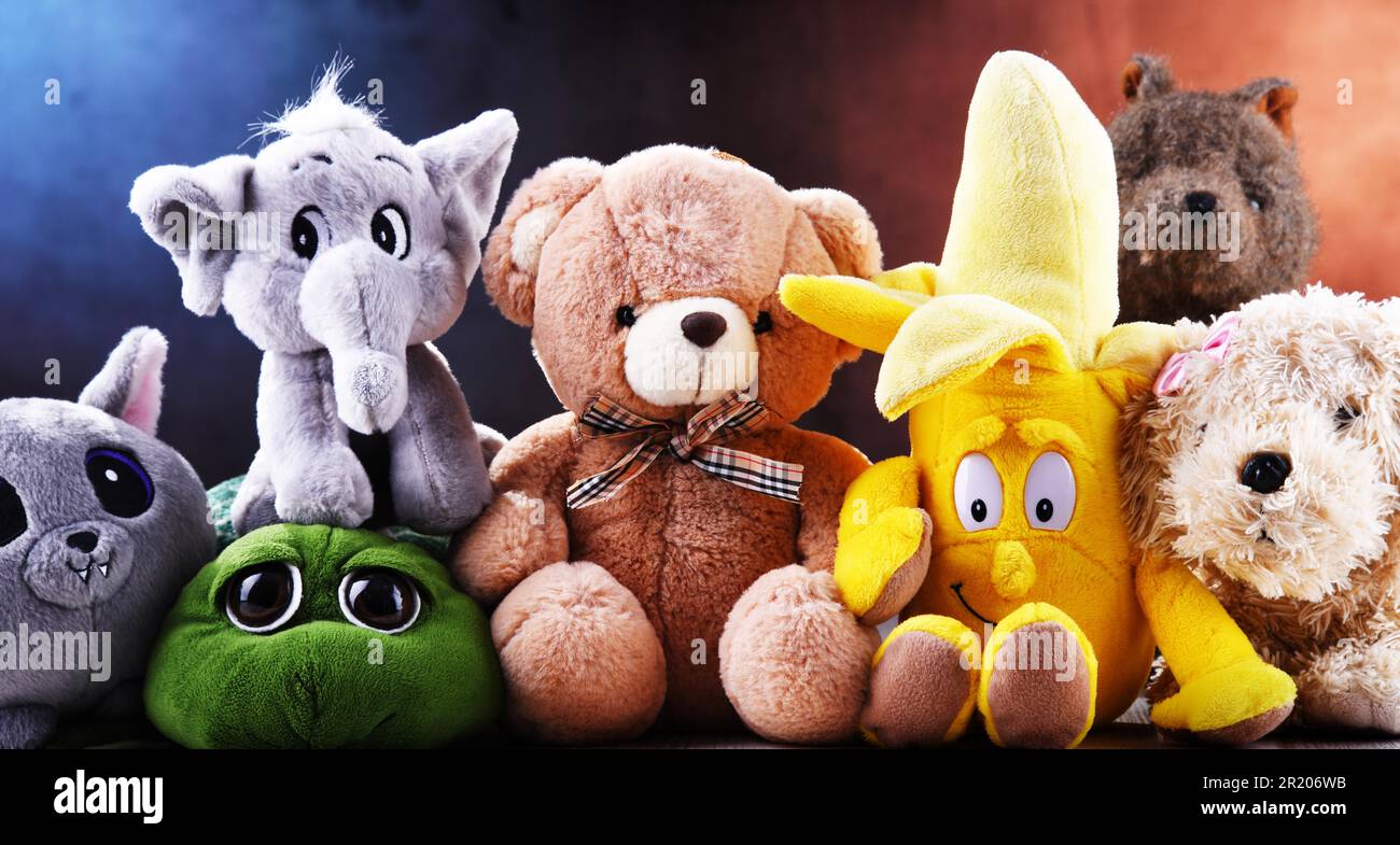 Group of stuffed animal toys in a children's room Stock Photo - Alamy