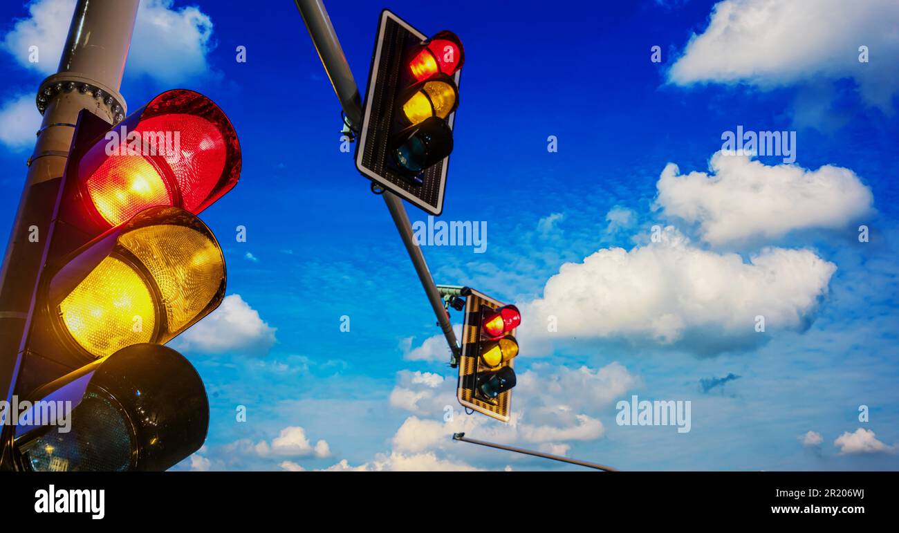 Traffic lights over urban intersection Stock Photo - Alamy