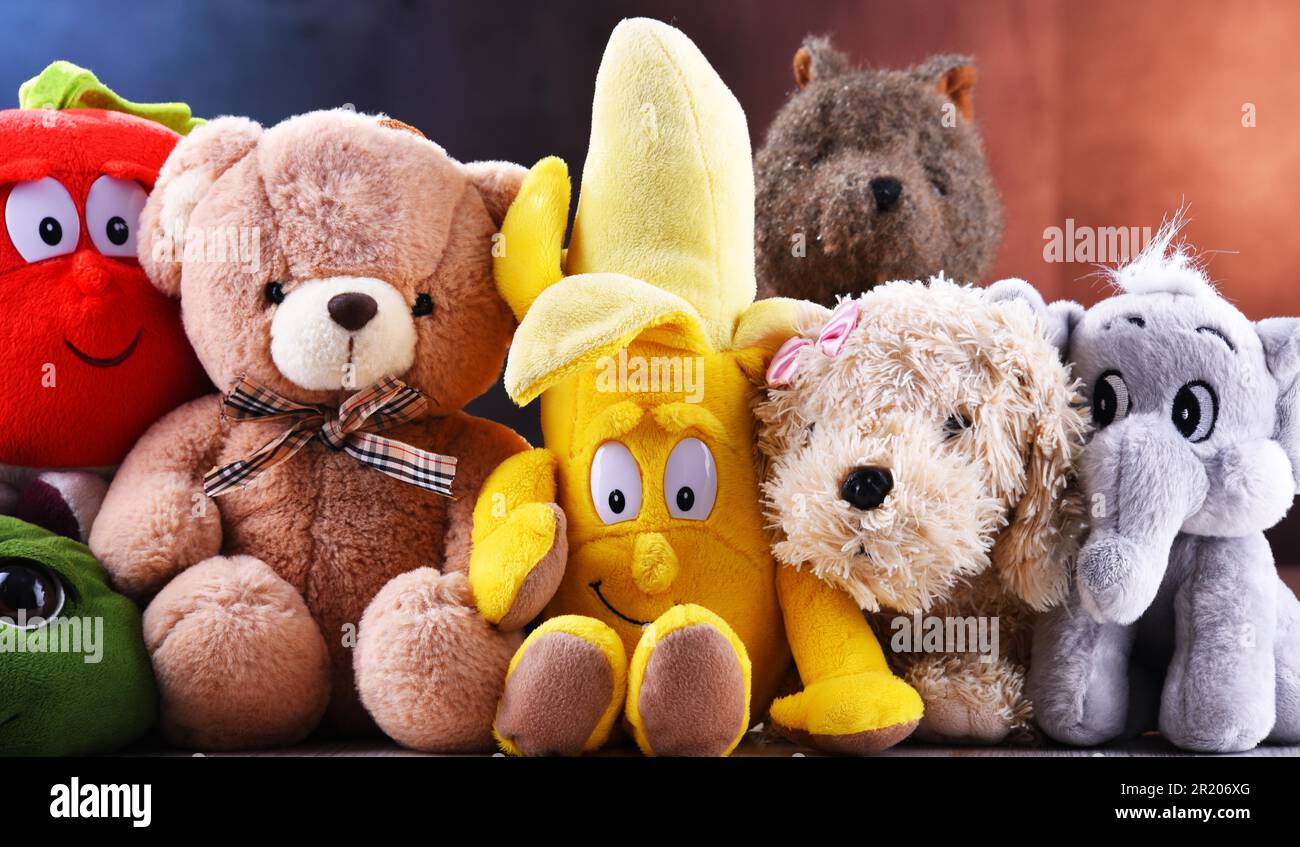 Group of stuffed animal toys in a children's room Stock Photo - Alamy