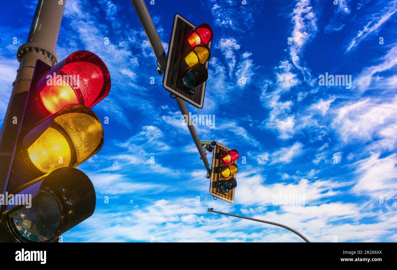 Traffic lights over urban intersection Stock Photo - Alamy