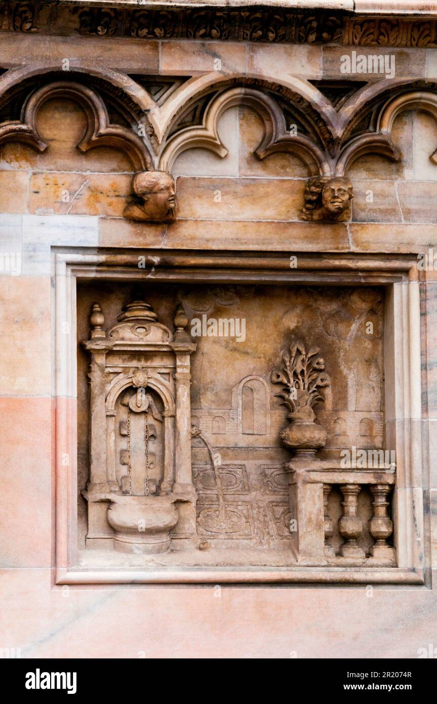Marble relief of a well, arch and balustrade, Milan Cathedral, Italy ...