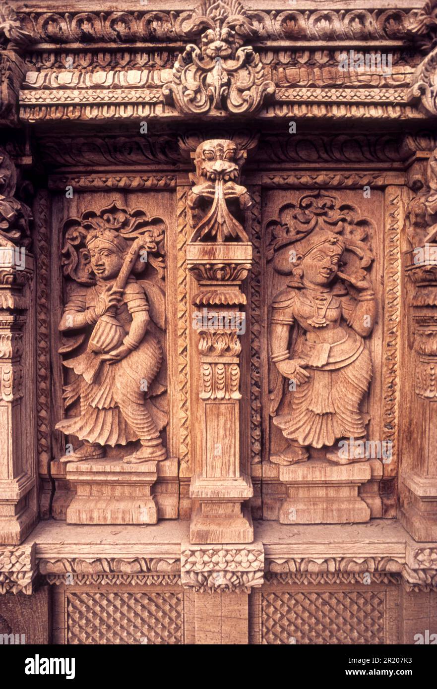 17th century wooden carvings depicting Veena playing and a dancer in ...