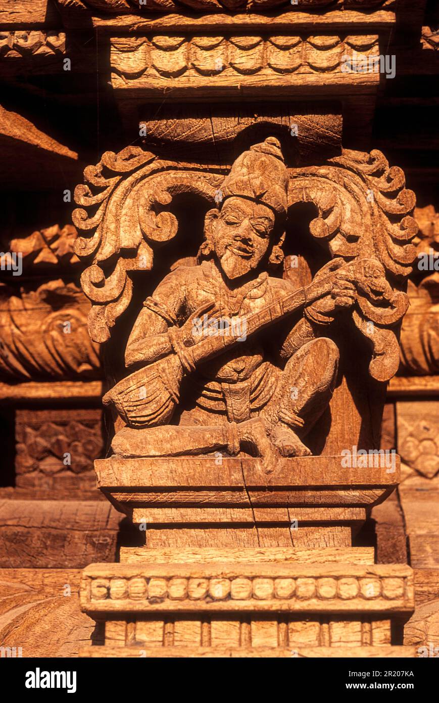 Playing Veena, 17th century wooden carvings in Meenakshi-Sundareswarar ...