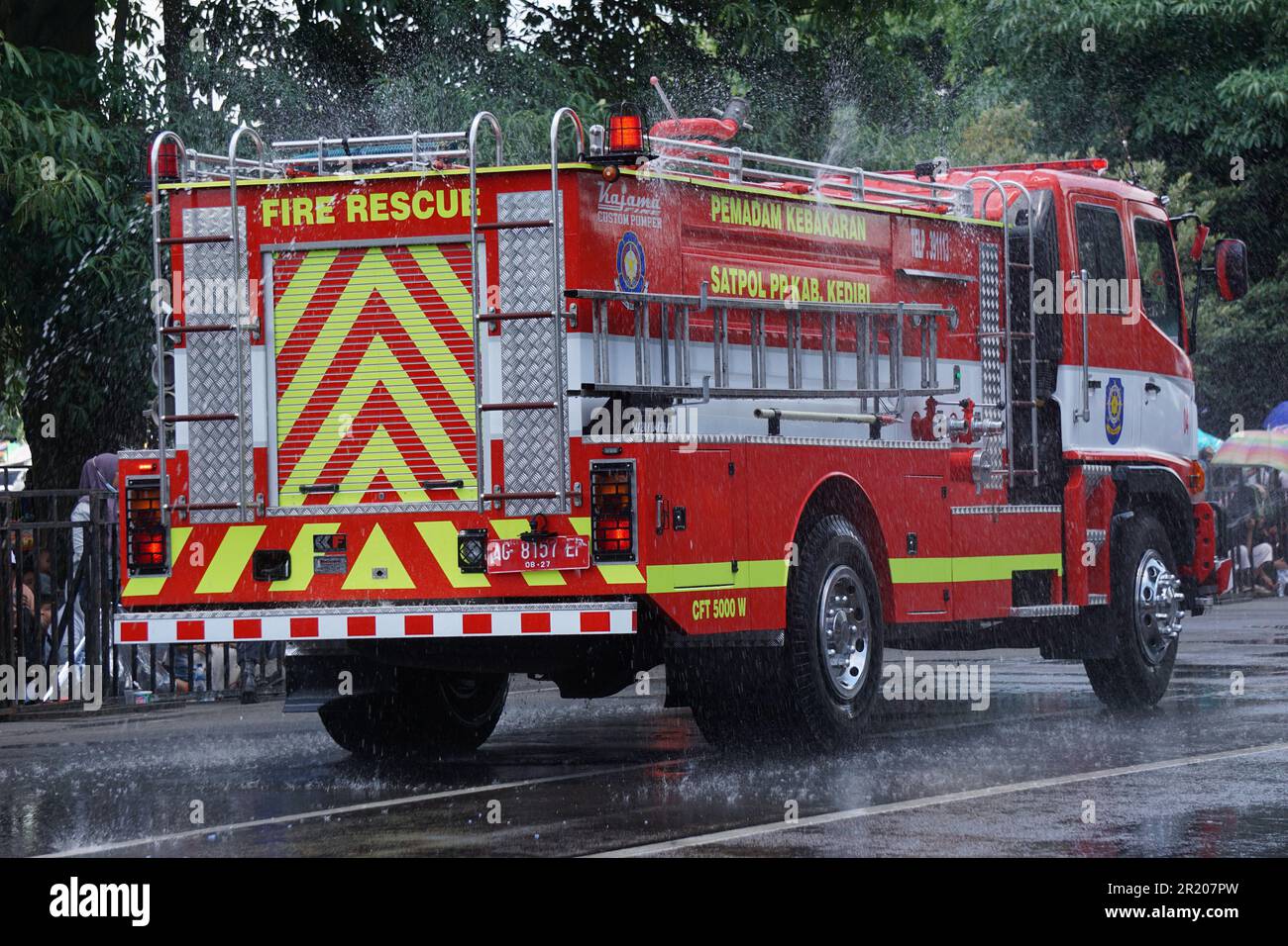 Red fire truck on the road Stock Photo - Alamy