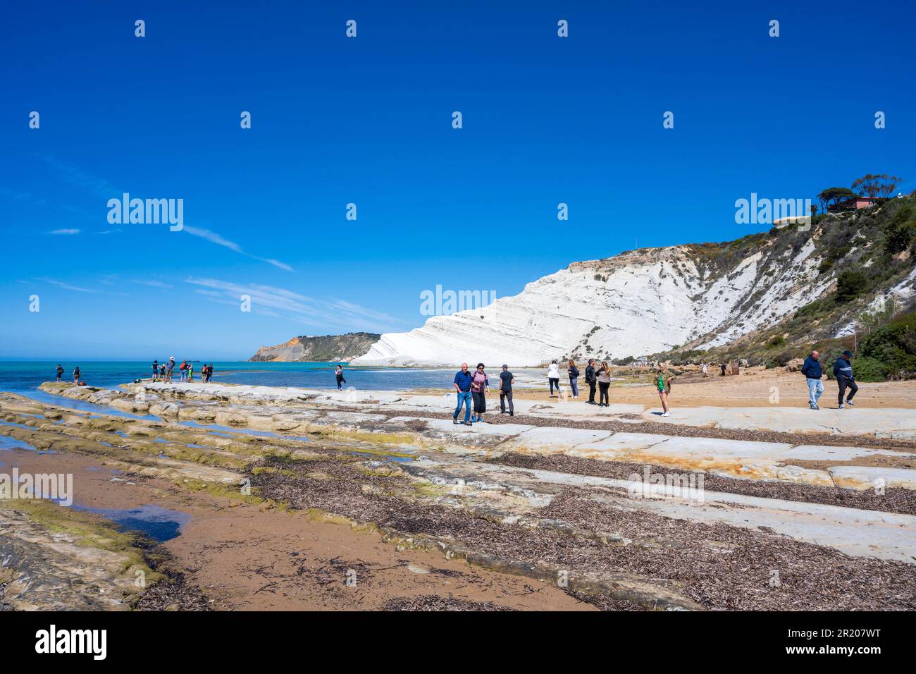 Tourists at the chalk cliff Scala dei Turchi, Turkish Steps, Realmonte ...