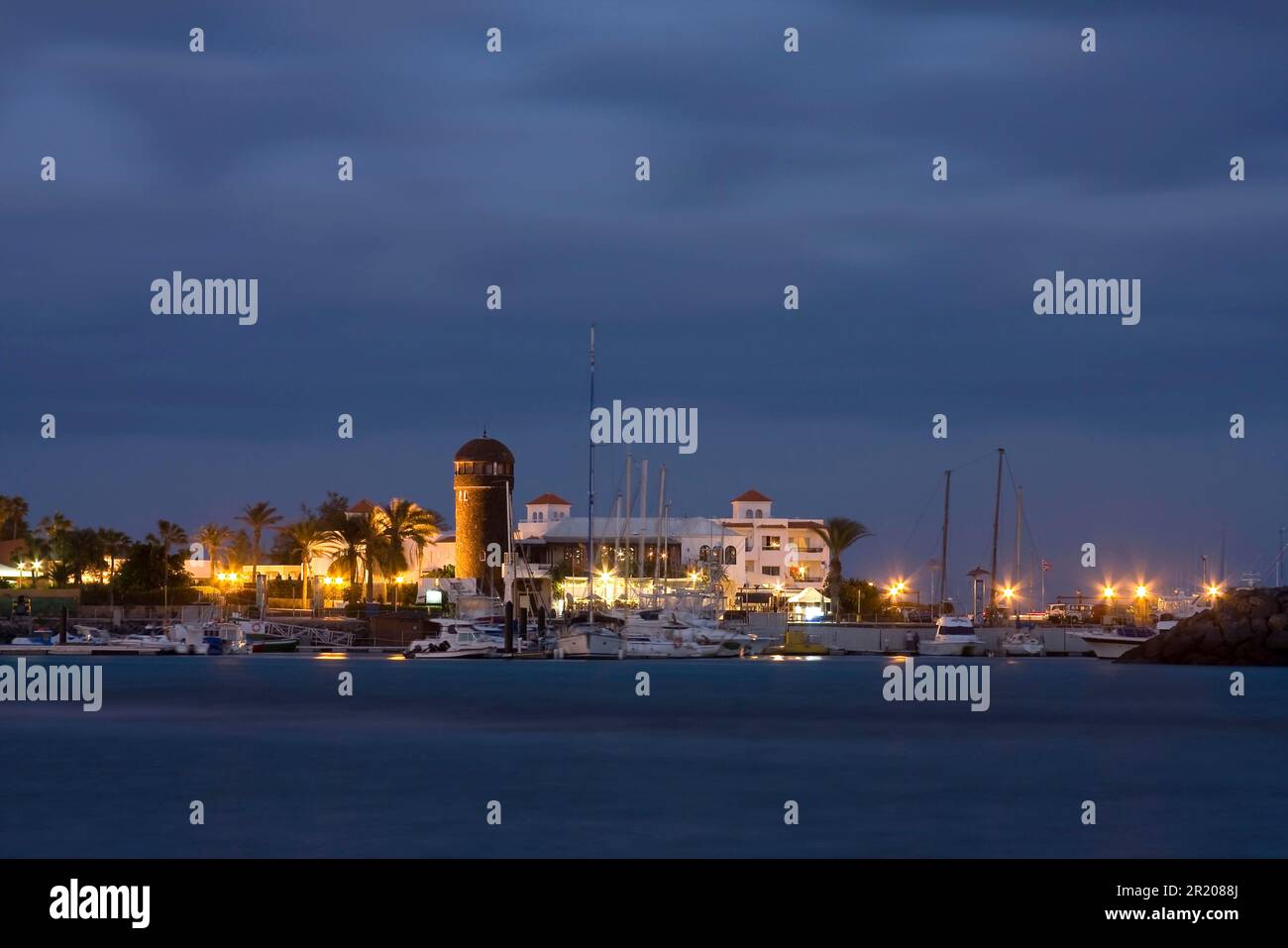 Marina with lighthouse, Caleta de Fustes, Fuerteventura, Canary Islands ...