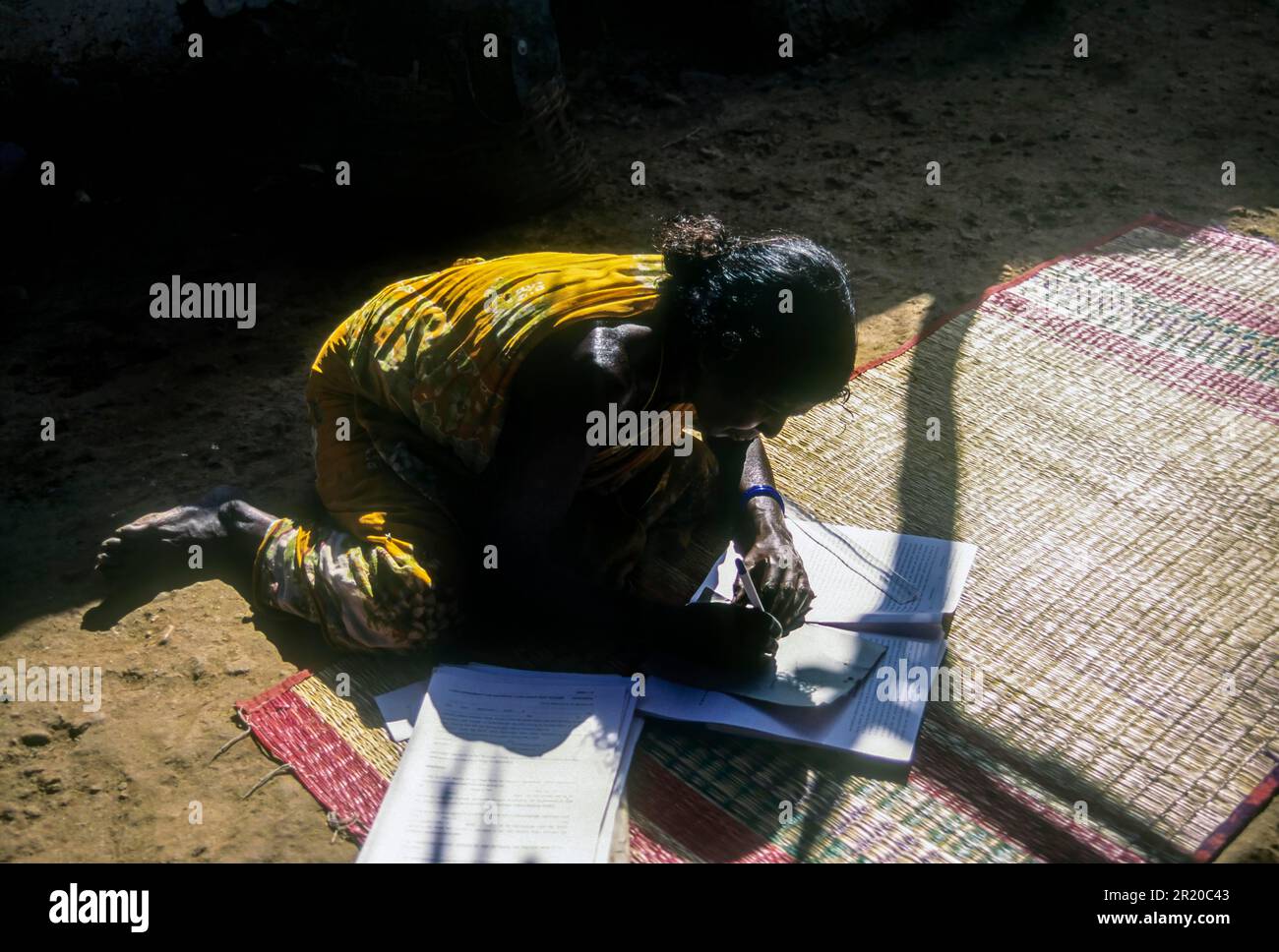 Tribal woman studying hi-res stock photography and images - Alamy