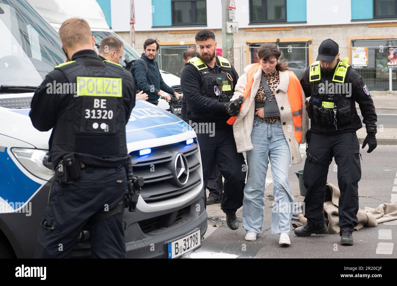 Berlin, Germany. 16th May, 2023. Police forces lead away during a ...