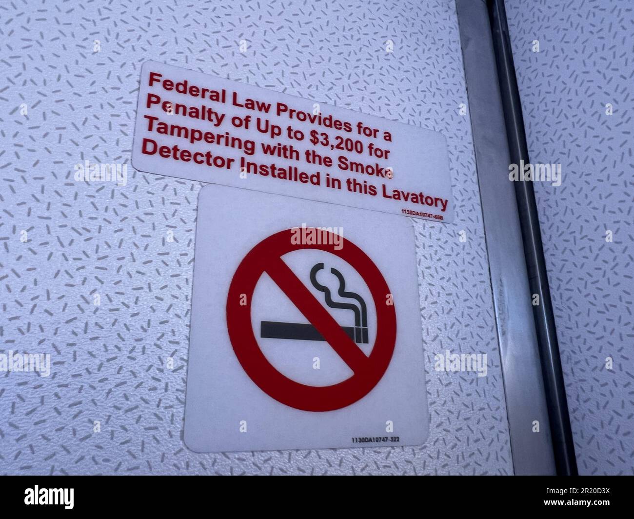 USA. 09th Mar, 2023. No smoking sign and warning regarding tampering ...