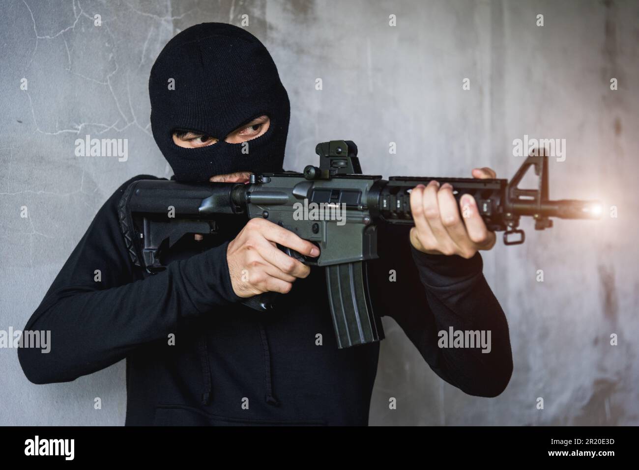 Commando with Helmet holding M16 gun Stock Photo - Alamy