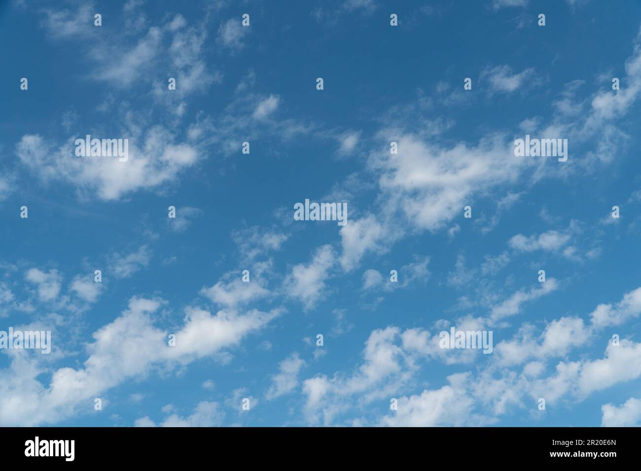 lovely blue sky with a few scattered white clouds. cloudscape and sky ...