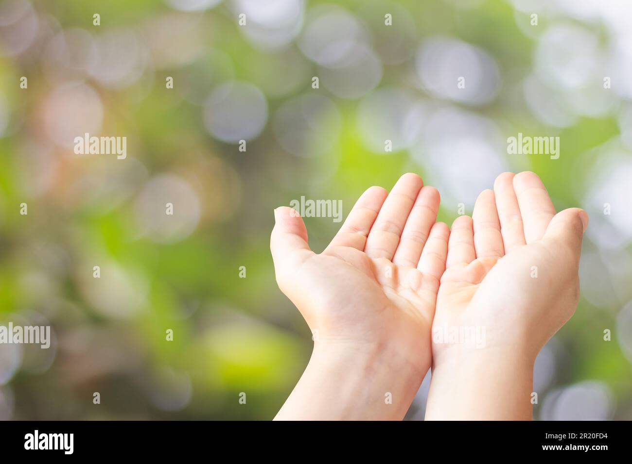 Open hand prayer hi-res stock photography and images - Alamy