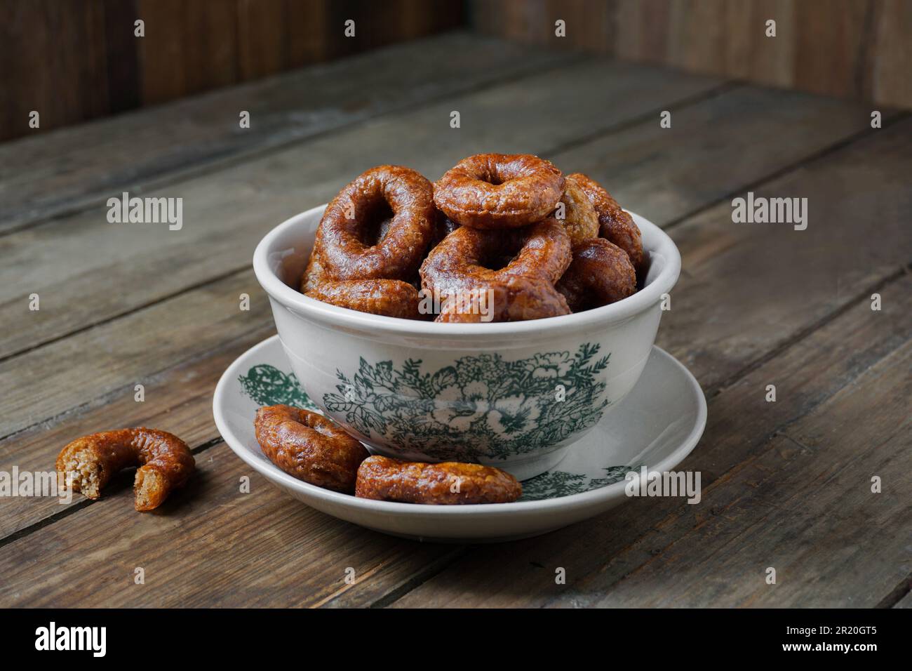 Malay traditional snack called "Peneram, Denderam, or Adhirasam" is ...