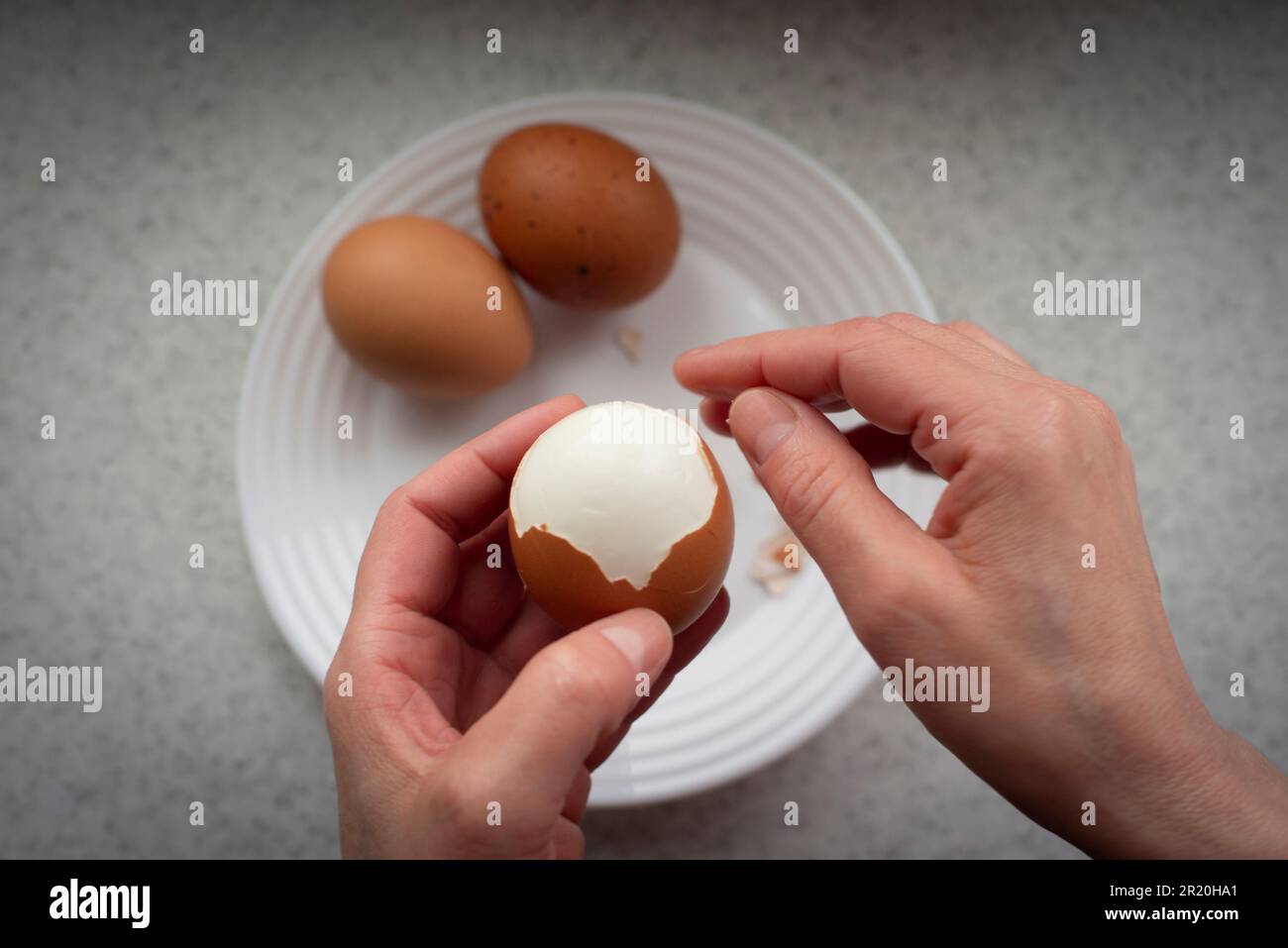 Peeling eggs hi-res stock photography and images - Alamy