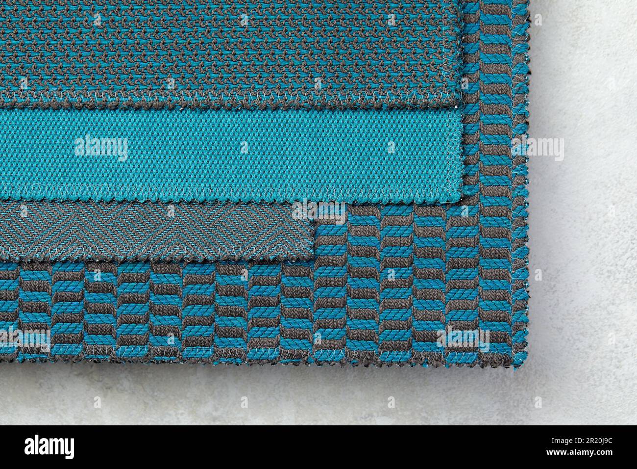 The background consists of several types of old colored tiles with ...