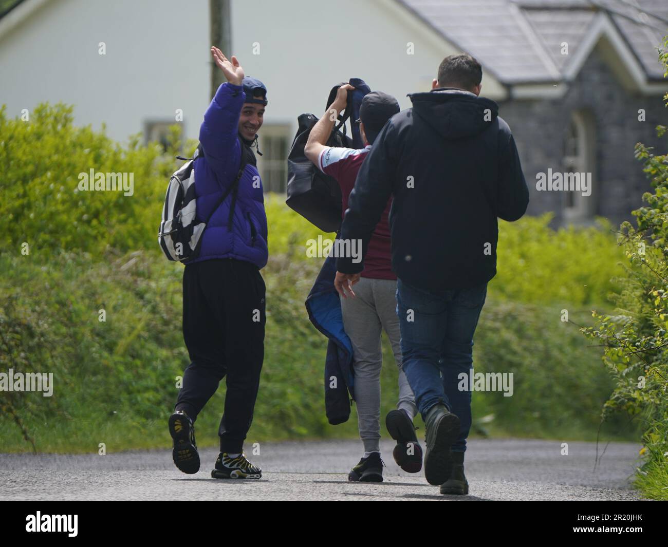 Asylum seekers leaving the grounds of the Magowna House hotel in Inch ...