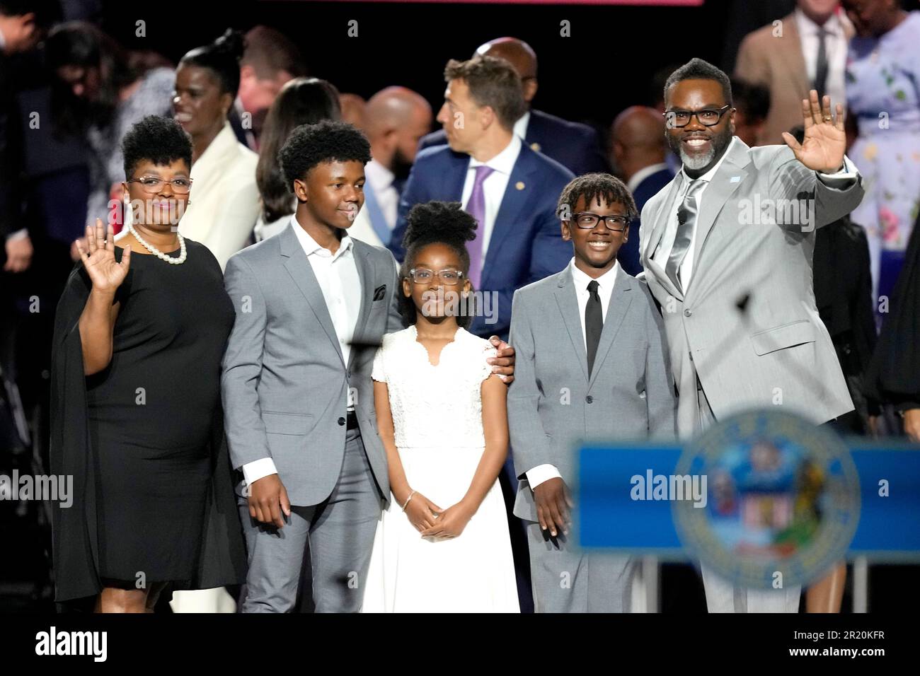 Chicago Mayor Brandon Johnson, right, stands with his family from left ...