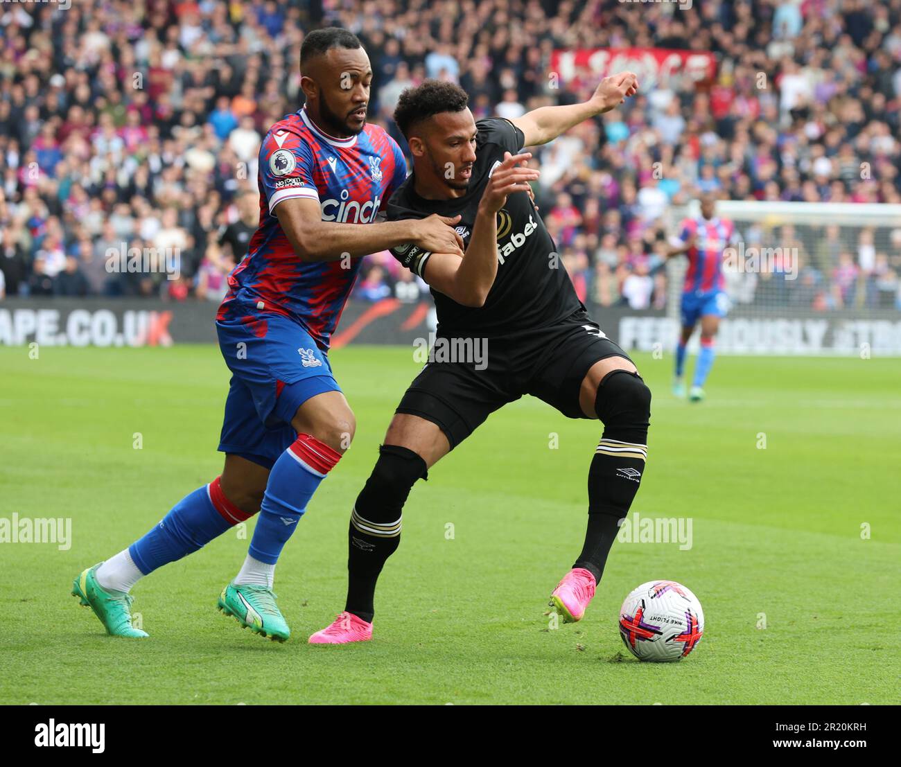 Lloyd Kelly of AFC Bournemouth under pressure from Crystal Palace's ...