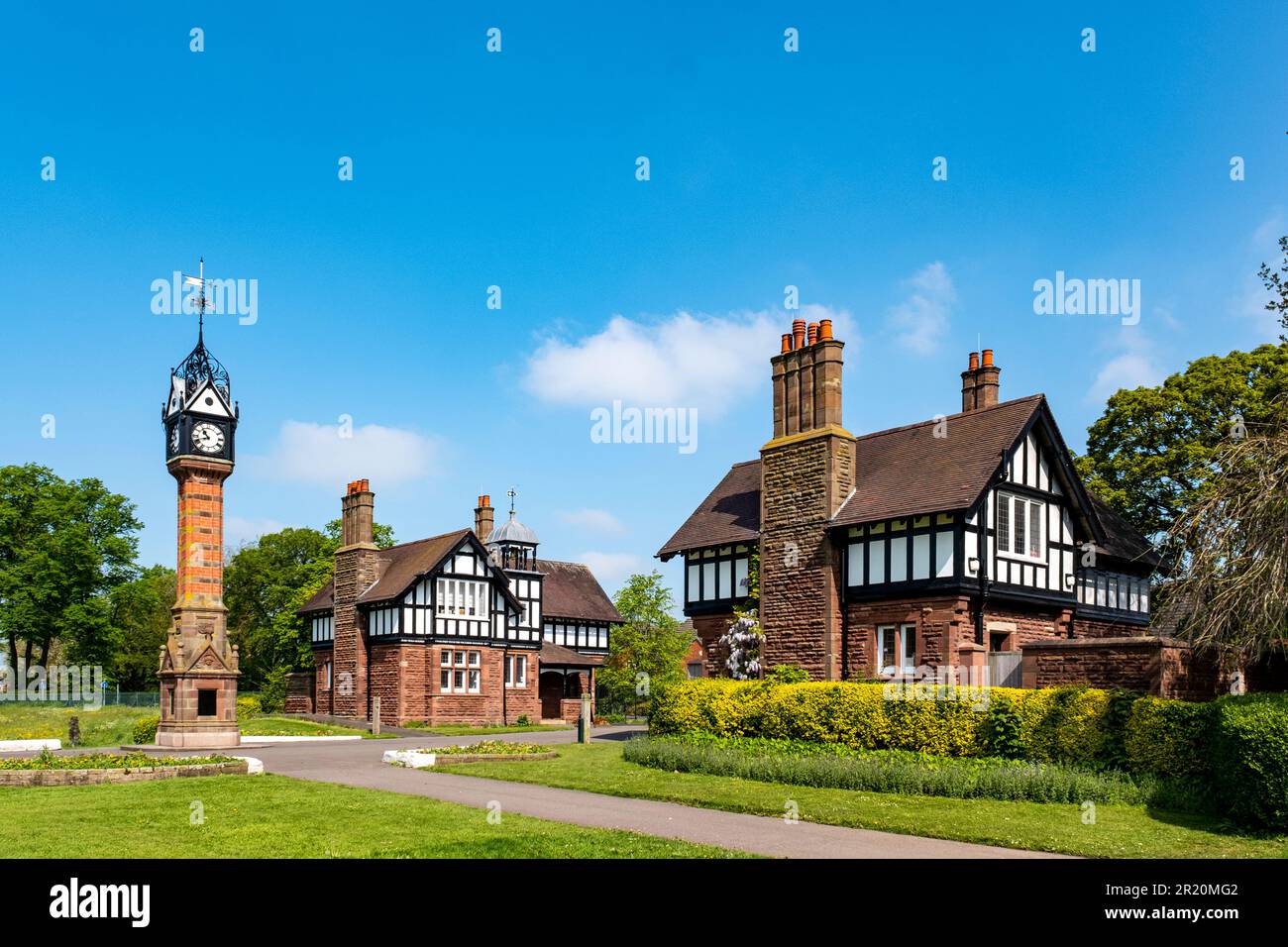 The clock tower with West Lodge, left, and East Lodge in Queens Park ...