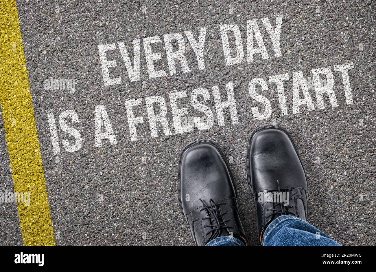 Text on the road - Every day is a fresh start Stock Photo - Alamy