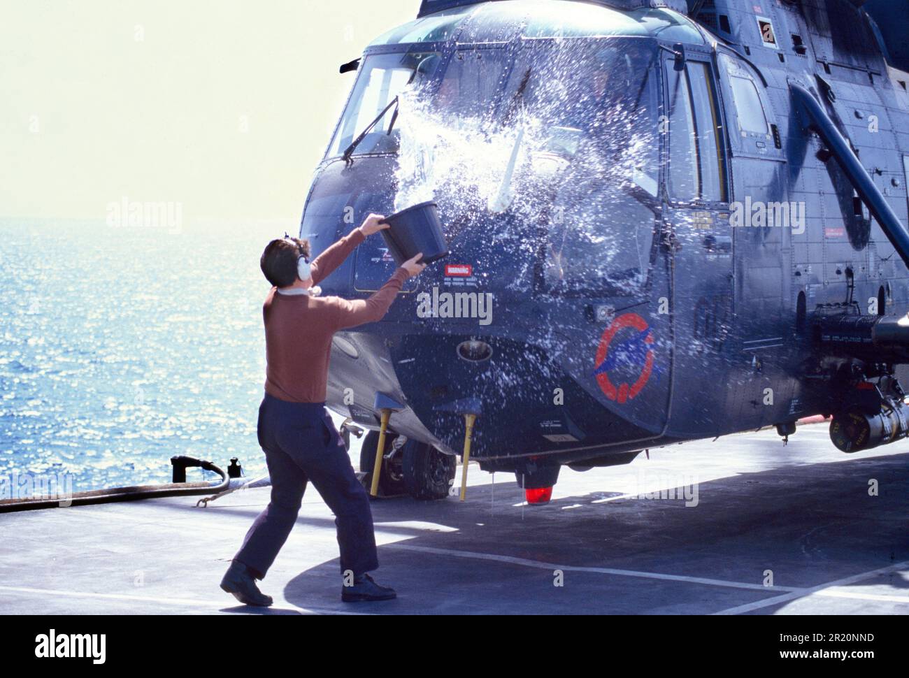 HMS Invincible crew preparing Sea King helicopter, 1984 Stock Photo - Alamy