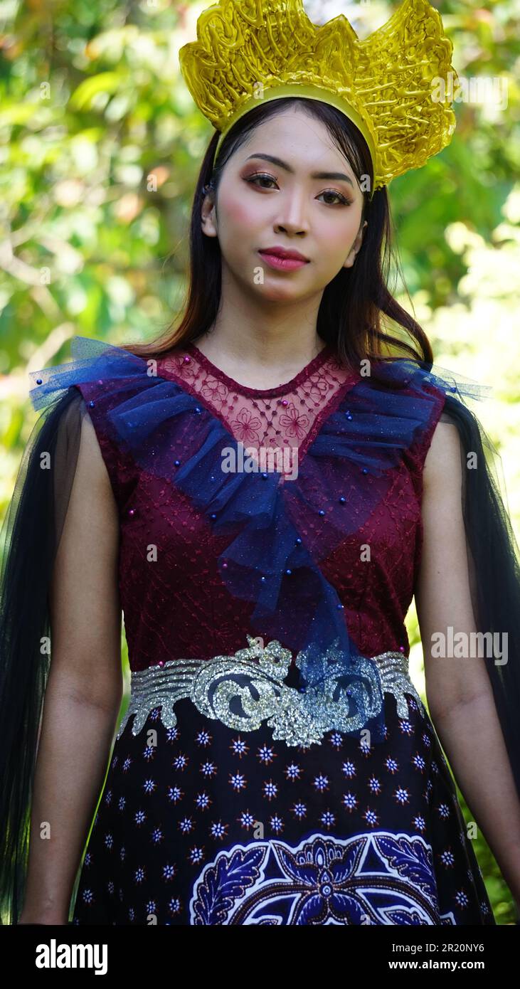Indonesian model with batik clothes Stock Photo - Alamy