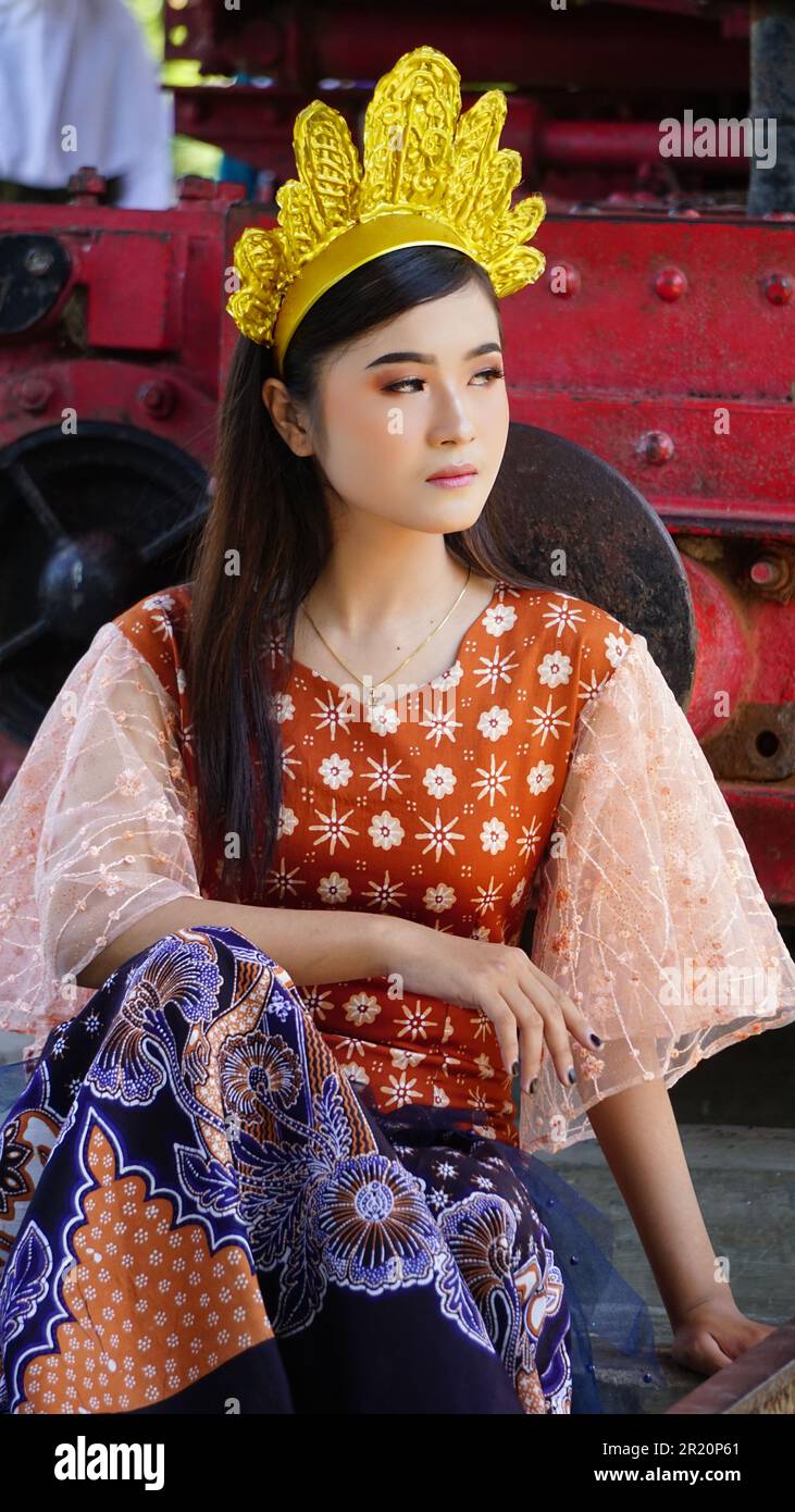 Indonesian model with batik clothes Stock Photo - Alamy