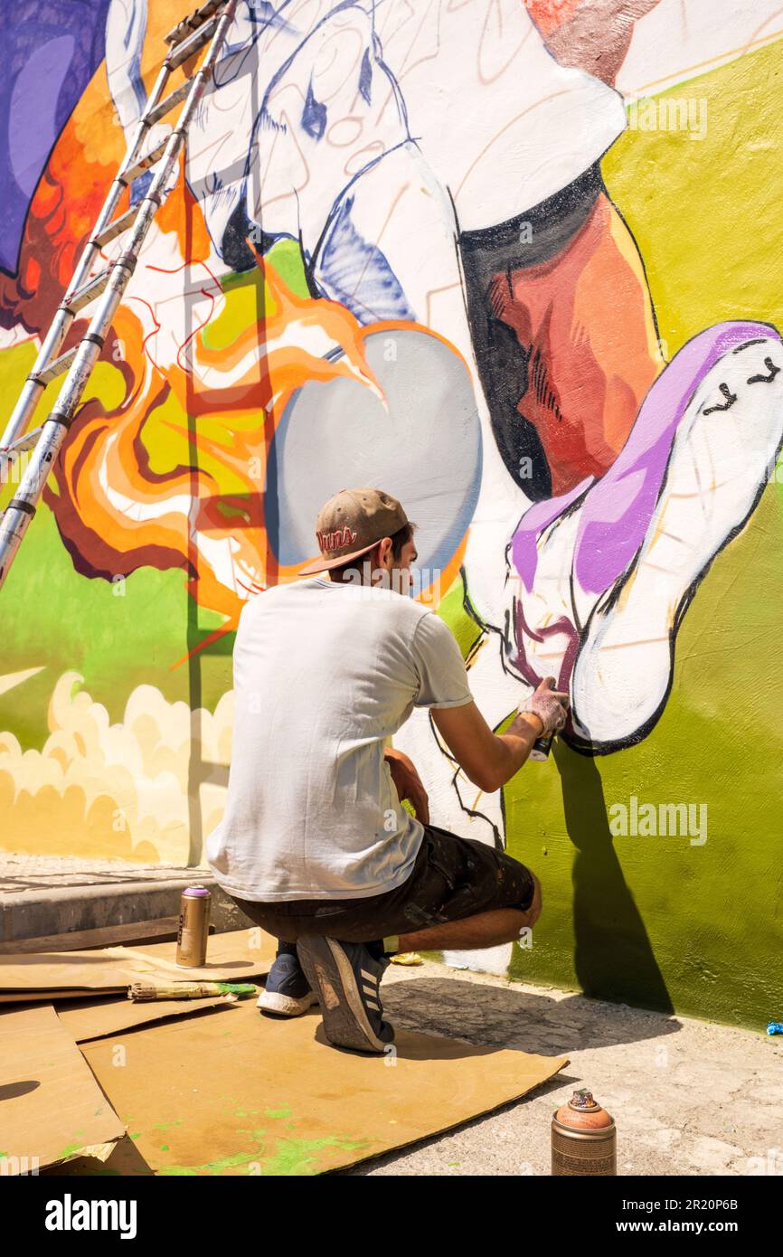 Graffiti Street artist Yeko into action in Spain Stock Photo - Alamy