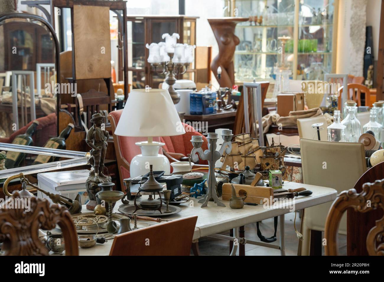 old antique shop inside with heap of different stuff Stock Photo - Alamy