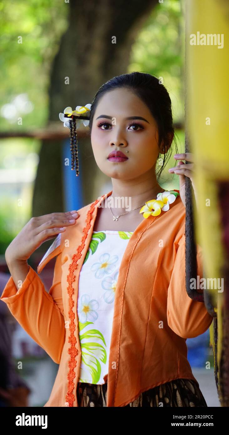 Indonesian model with batik clothes Stock Photo - Alamy