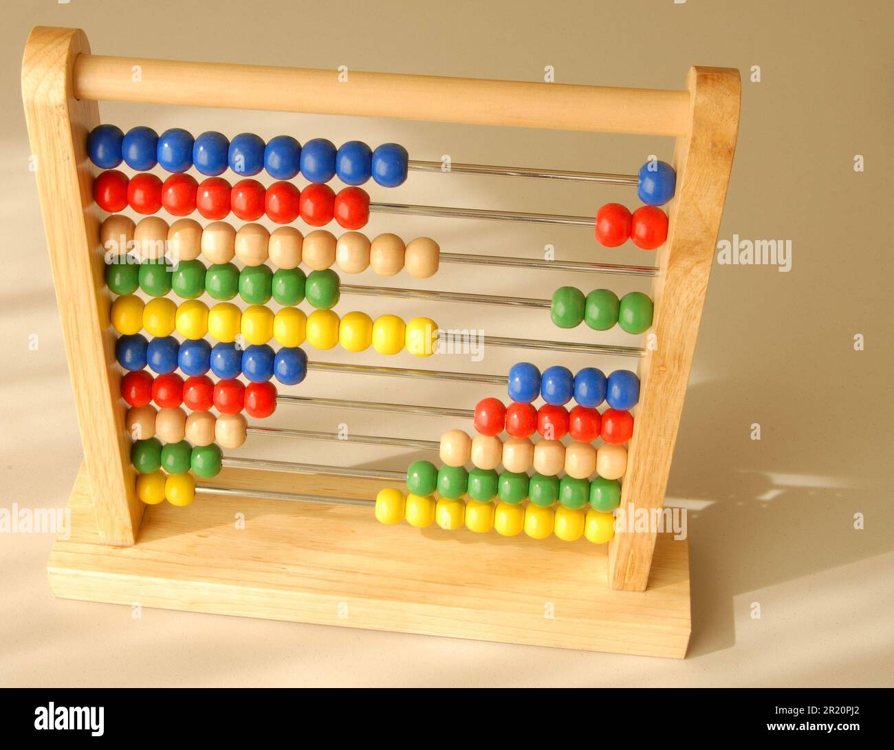 Colorful and all wooden asian abacus calculator Stock Photo - Alamy