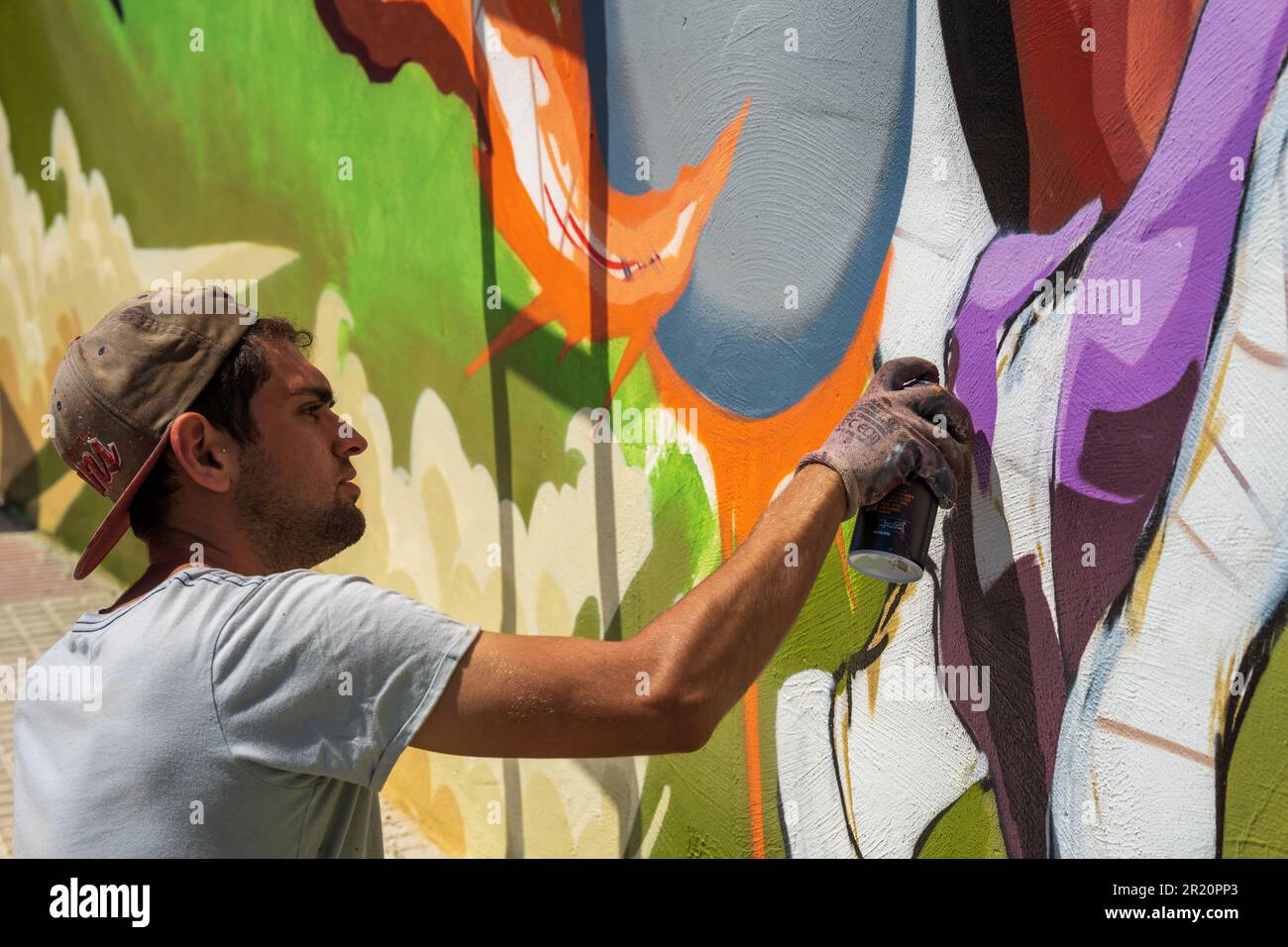 Graffiti Street artist Yeko into action in Spain Stock Photo - Alamy