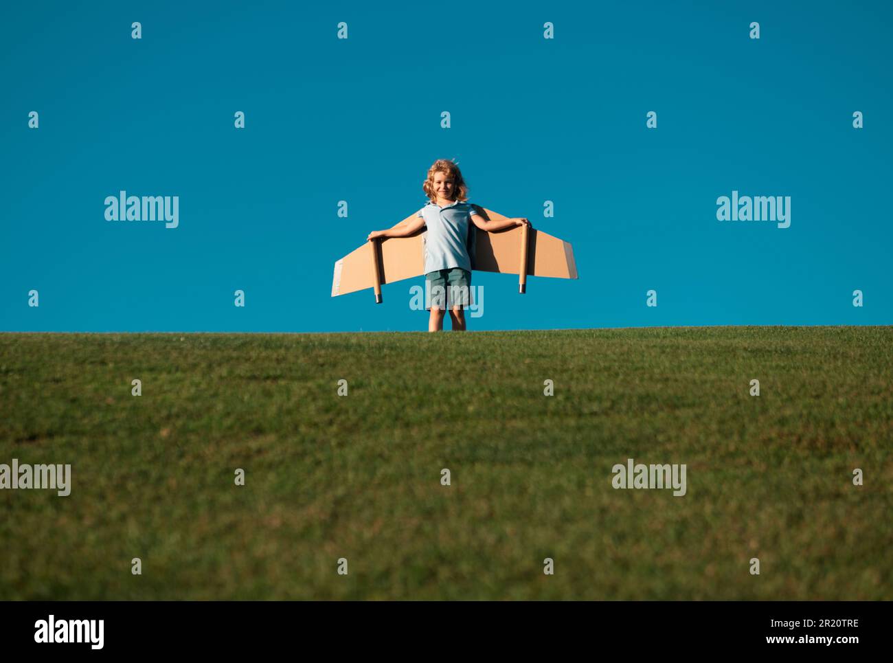 Child playing with toy jetpack. Child pilot astronaut or spaceman ...