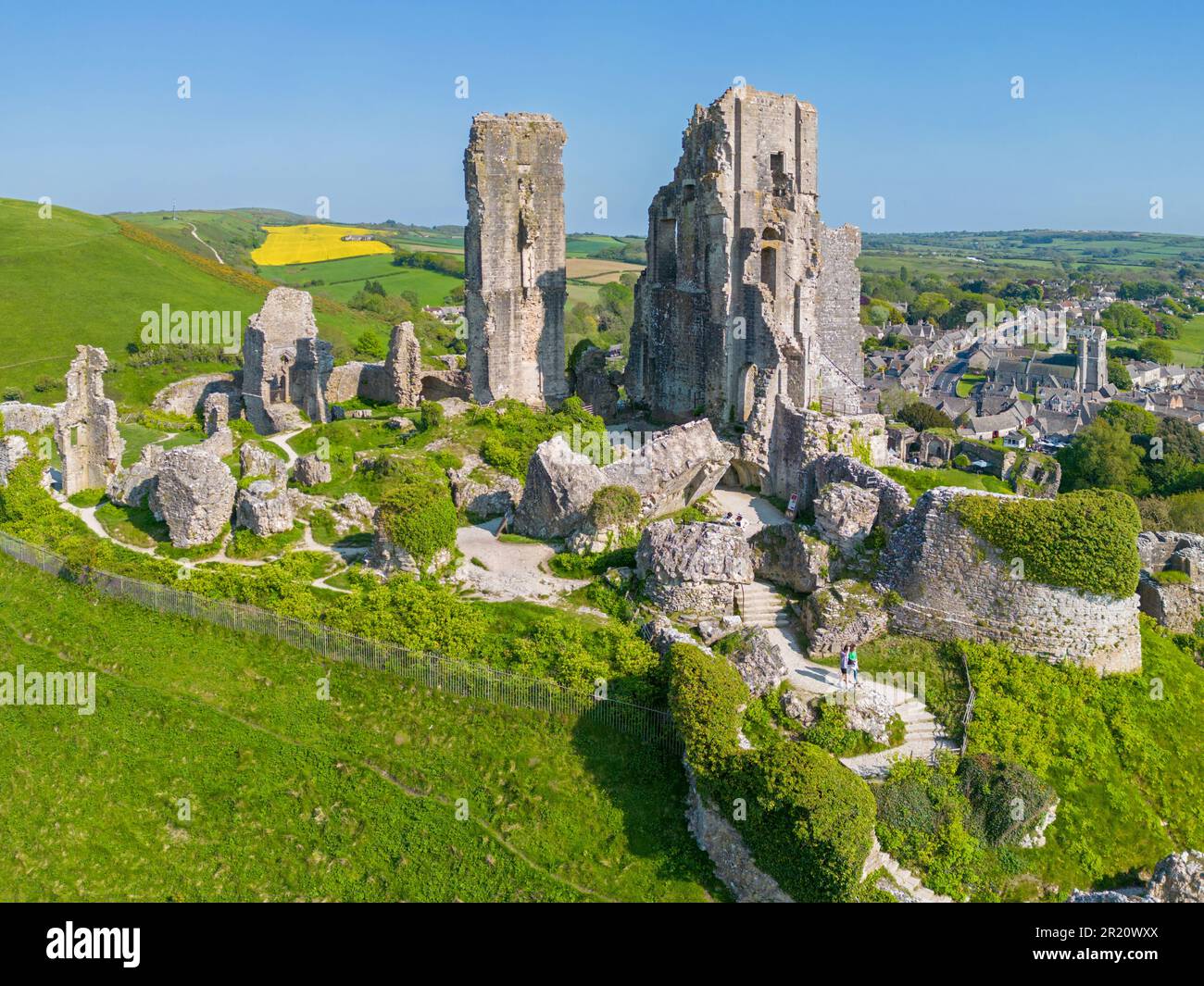 Corfe Castle, Dorset, United Kingdom. Lovely Spring time Aerial Image of 11th Century built ...
