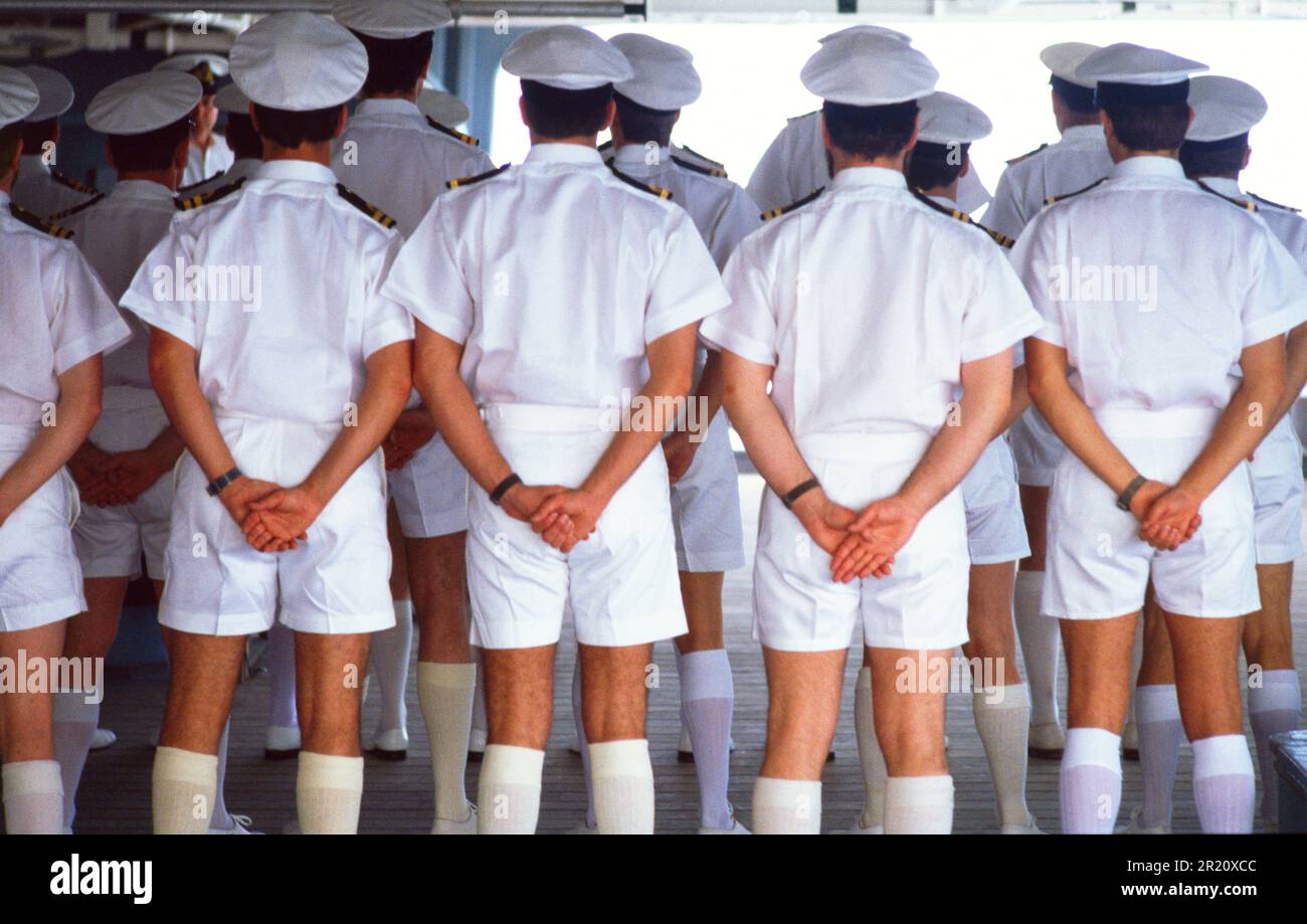 Royal Naval officers await inspection on the HMS Invincible, 1984 Stock ...